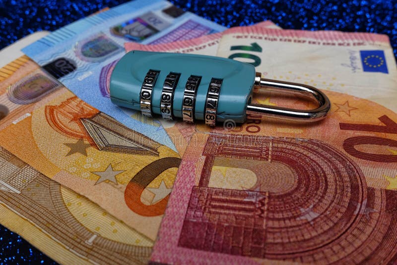 Combination Lock on Paper Currency Stock Photo - Image of combination ...