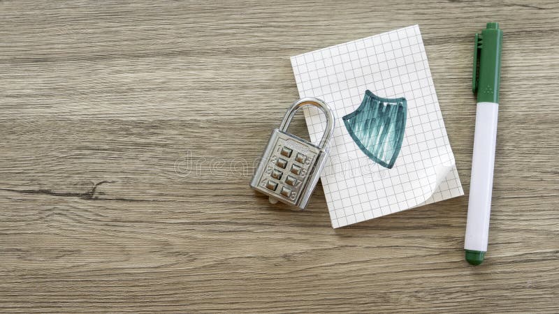 Combination Lock, Shield Drawing, and Green Pen on Graph Paper Notebook ...