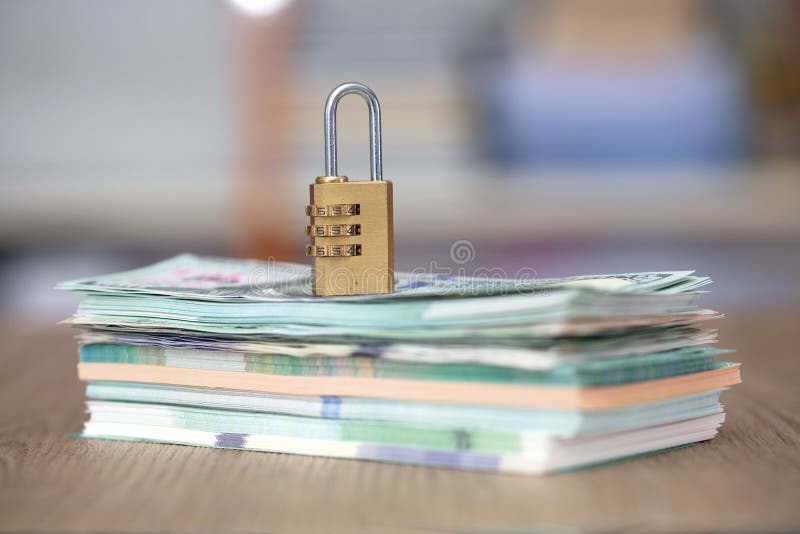 A Combination Lock on a Stack of Coins Stock Image - Image of fund ...