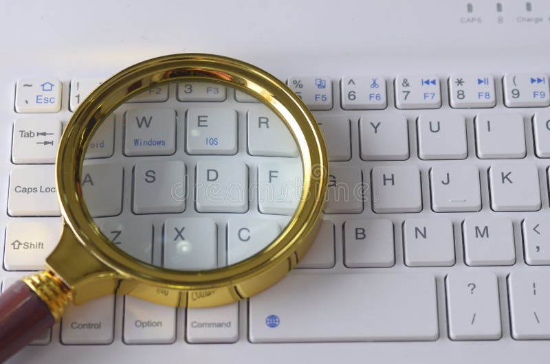 The Combination of a Magnifying Glass and a Keyboard Could Symbolize ...