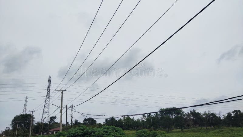 A Combination of Several Power Cables and Towers that are Installed ...