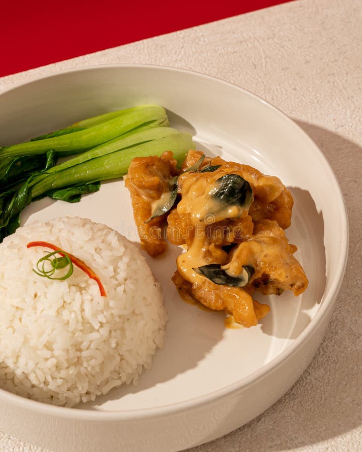 The Combination of Soft Salted Egg Sauce and Crunchy Fried Chicken is ...