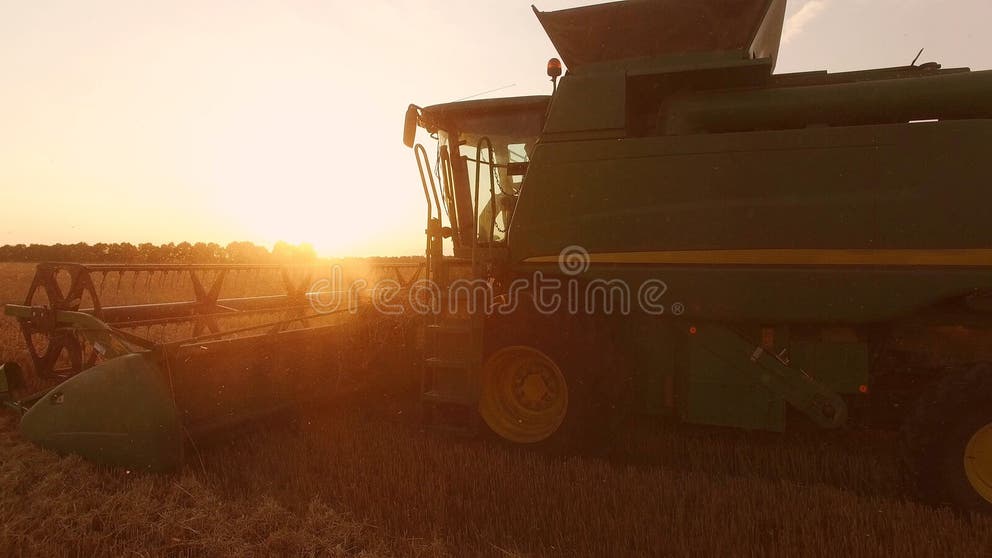 Combine, field and sky. stock photo. Image of economy - 160457316
