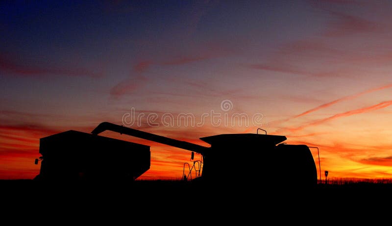 Combine and Grain Cart at Sunset Stock Image - Image of harvest ...