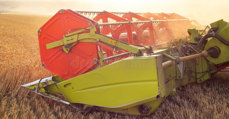 Combine Harvester Close Up. Combine Harvester Harvesting Wheat at ...