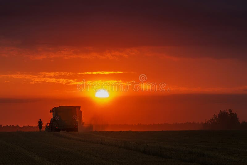 Combine Harvester at Sunset Stock Image - Image of landscape, combine ...