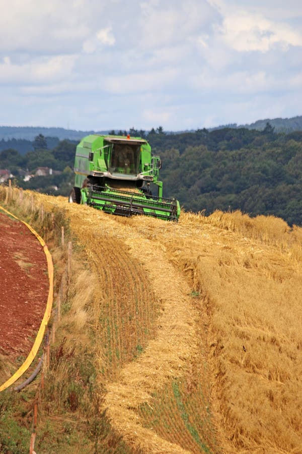 Combine Harvester at work stock photo. Image of combine - 124469720