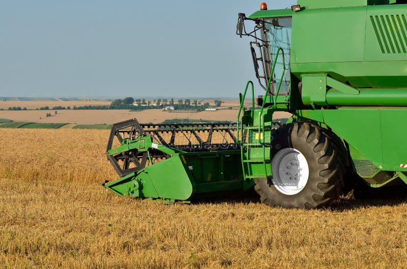 Combine harvester at work stock photo. Image of corn - 34109688