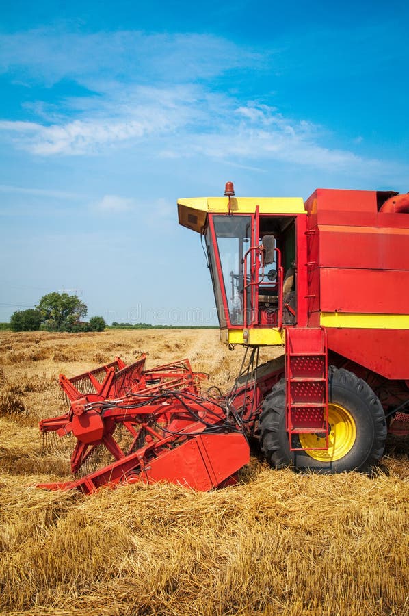Combine harvesting wheat stock image. Image of bread - 32182753