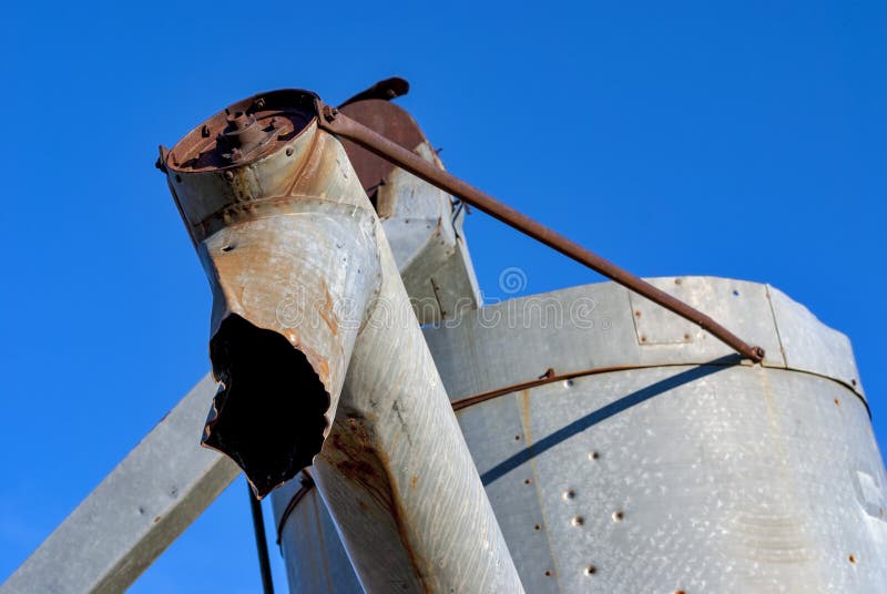 Combine Hopper Arm Detail with Deep Blue Sky Stock Photo - Image of ...