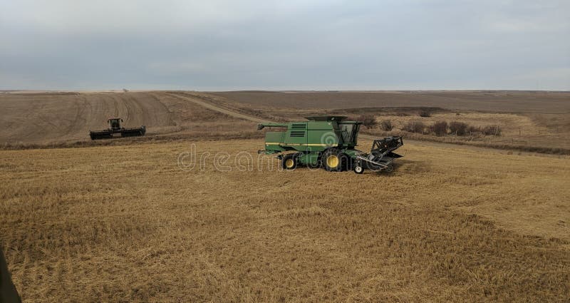 Combine and swather editorial photography. Image of swather - 162338652