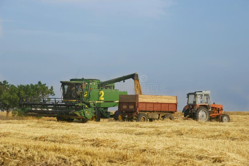 Combine and tractor editorial stock image. Image of growing - 2668954