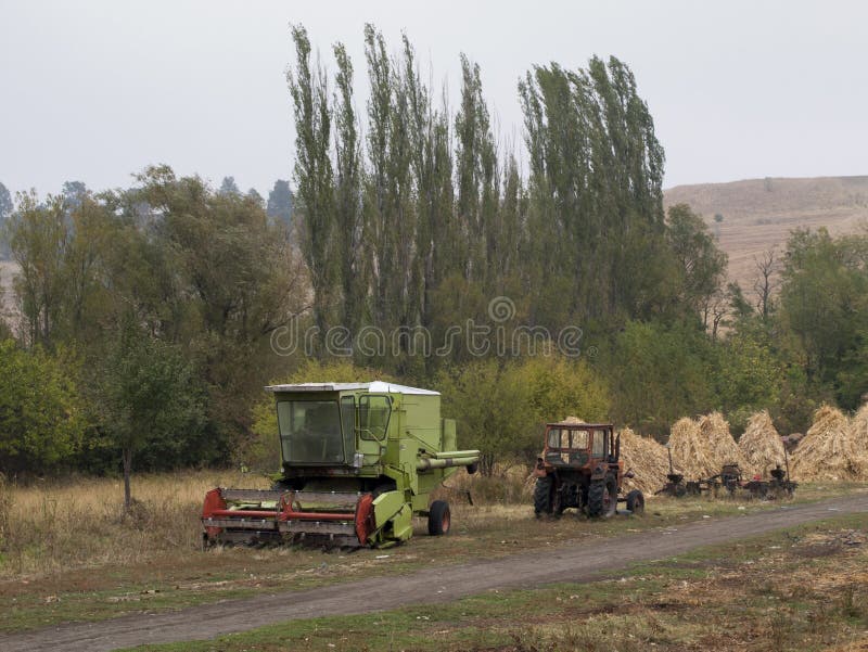 Combine and a Tractor Parked in the Yard of a Farm Stock Image - Image ...