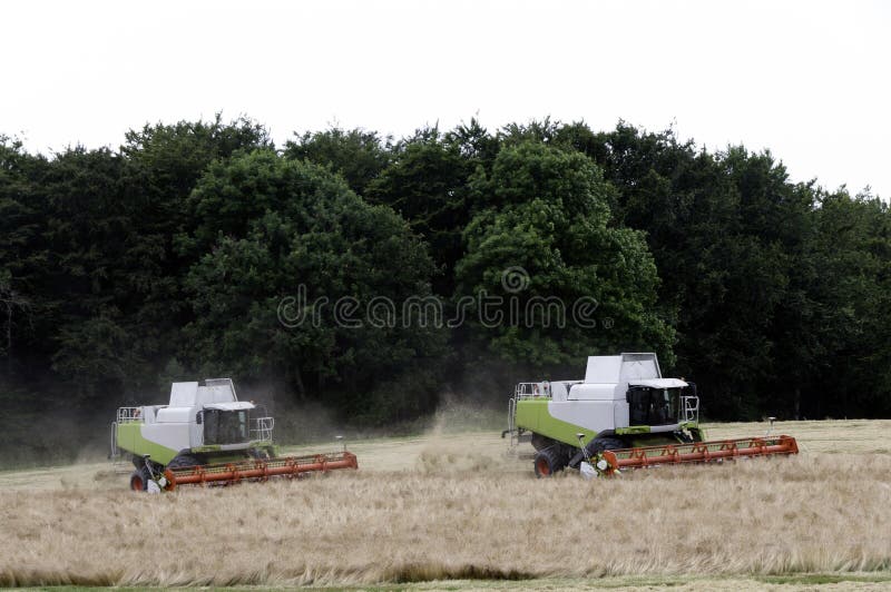 Combines editorial photo. Image of earth, field, agriculture - 20788121