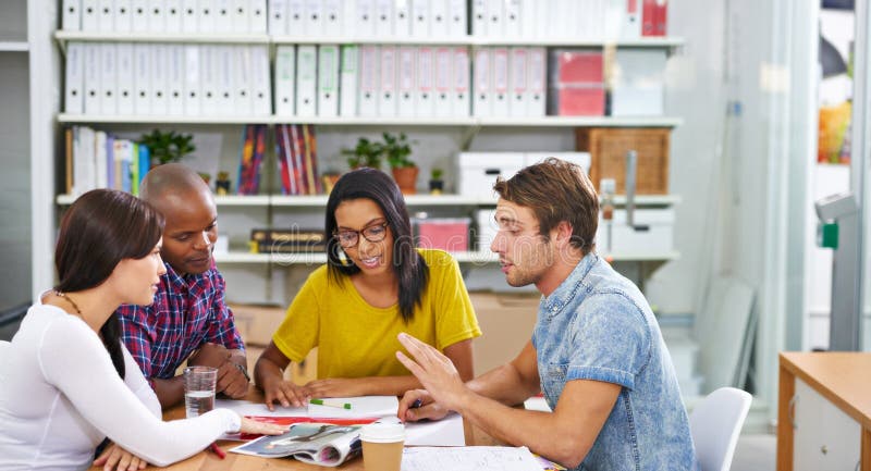 Combining Their Creative Juices. a Team of Design Professionals Working ...