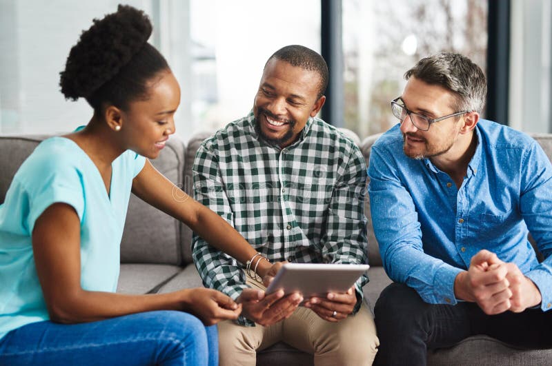 Combining Their Ideas To Make it Better. a Creative Team Discussing ...