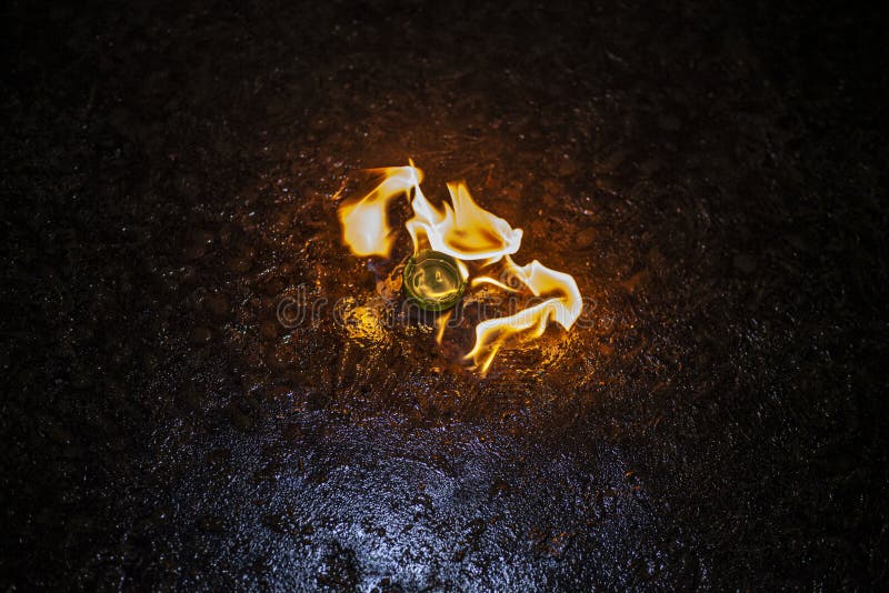 Combustion of Fuel. Flame of Fire on the Asphalt Stock Photo - Image of ...