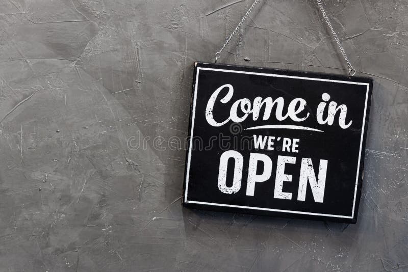 Come in we Re Open, Vintage Black Retro Sign in Back Wall Stock Photo ...