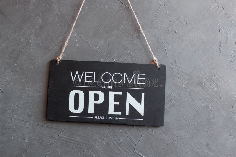 Come in we Re Open, Vintage Black Retro Sign in Back Wall Stock Image ...