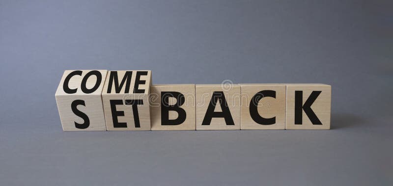 Comeback and Setback Symbol. Turned Cubes with Words Setback and ...
