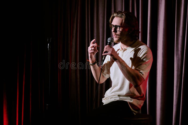 Performing Stand-Up Comedy Under Spotlight on Stage Stock Photo - Image ...