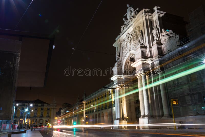 The Comercio Square and the Augusta Arch at Night with Light Tails ...