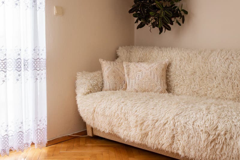 Comfortable Angle for Rest Time. Cozy Sofa with Woolen Blanket Stock ...