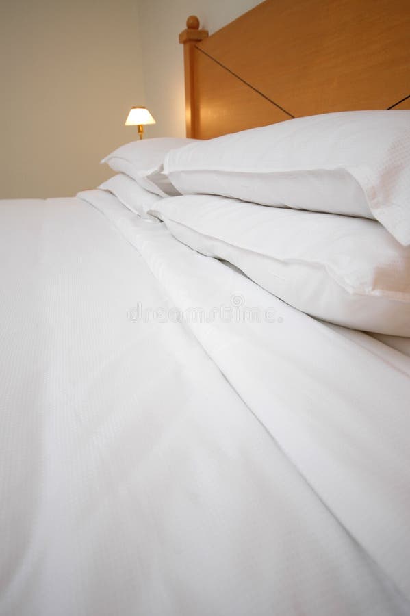 Comfortable Bed stock image. Image of fluffy, hotel, slumber - 2576051