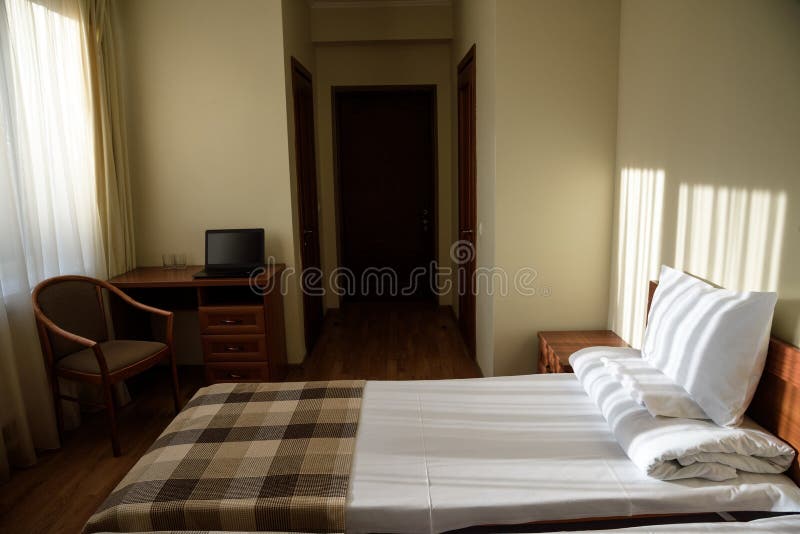 Comfortable Budget Hotel Bedroom Stock Image - Image of brown, bedsheet ...