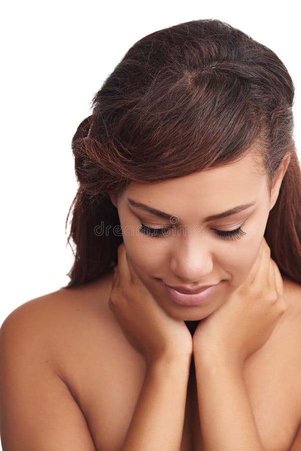 Comfortable In Her Own Skin A Beautiful Woman Posing Against A White