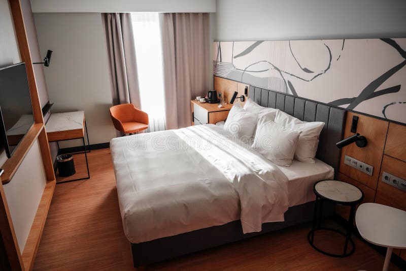 Comfortable hotel room stock image. Image of business - 235947131