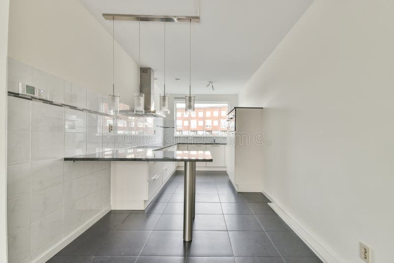 Light Narrow Kitchen with Windows Stock Image - Image of display, drink ...