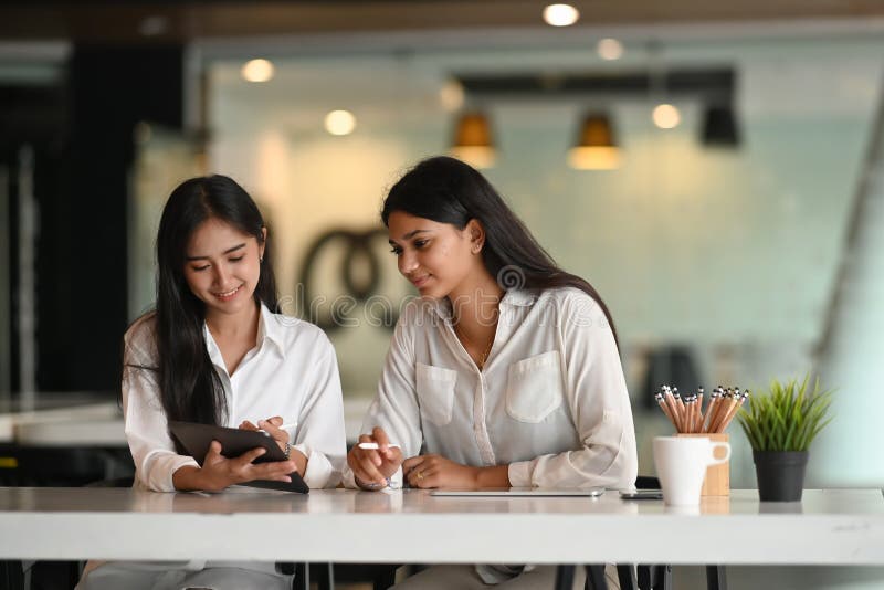 A Comfortable Office with Two Office Workers is Working Together. Stock ...