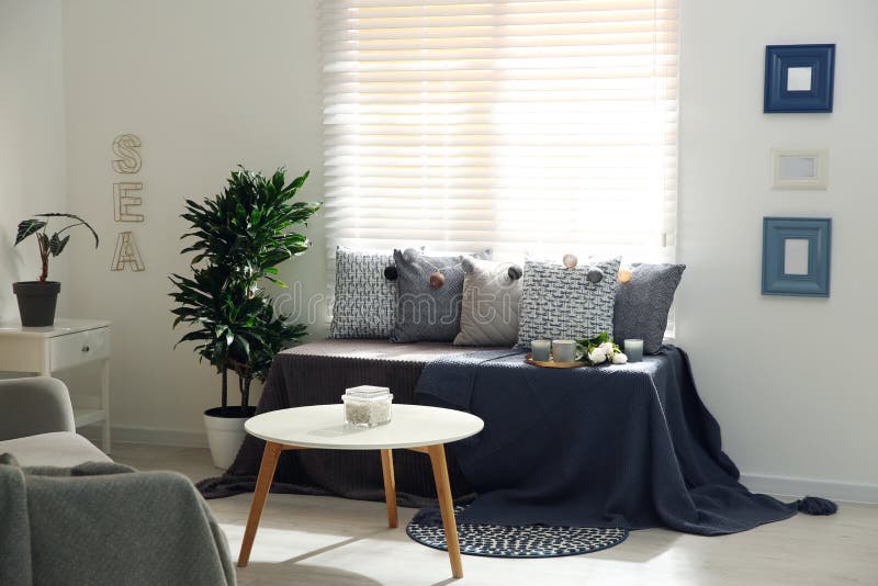 Comfortable Place for Rest with Cushions Near Window Stock Photo ...