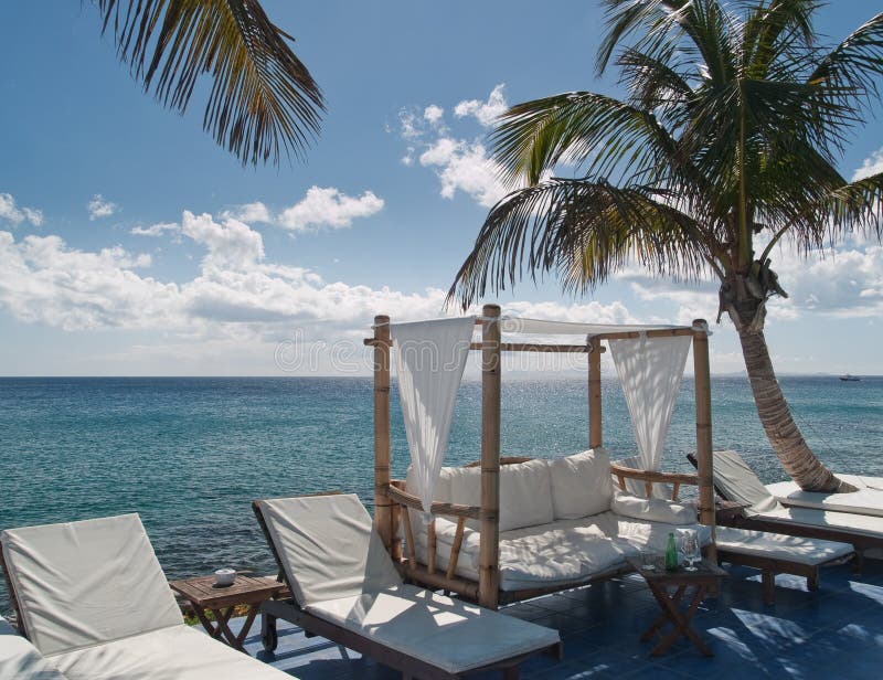 Comfortable Seating by the Sea Stock Image - Image of coastal, recliner ...