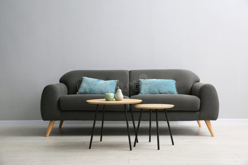 Comfortable Sofa Tables Near Grey Wall Room Stock Photos - Free ...