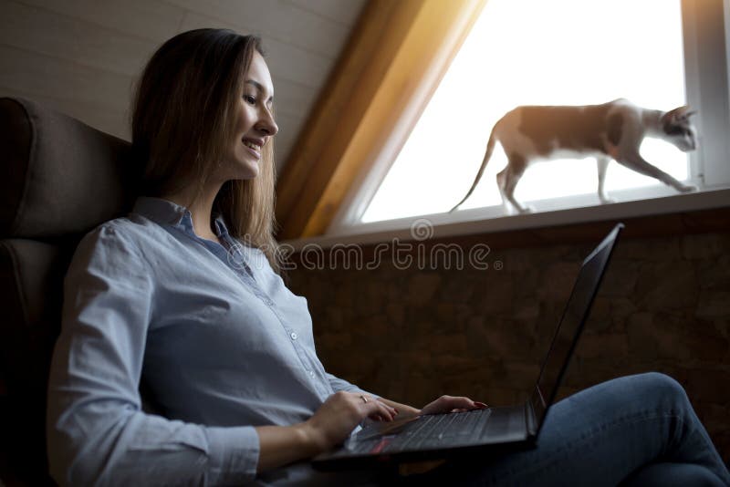 Comfortable Working Place. Beautiful Girl Working Remotely from Home ...