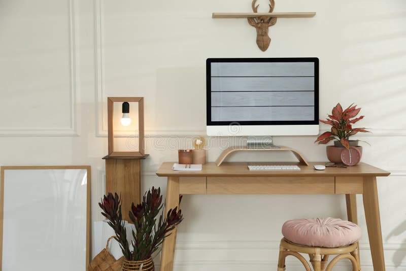 Comfortable Workplace with Modern Computer and Beautiful Plants in Room ...