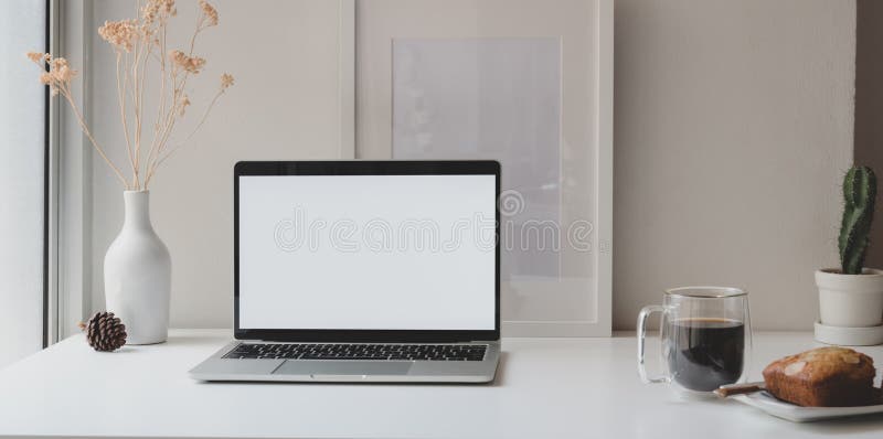 Comfortable Workplace with Open Blank Screen Laptop Computer and Mock ...