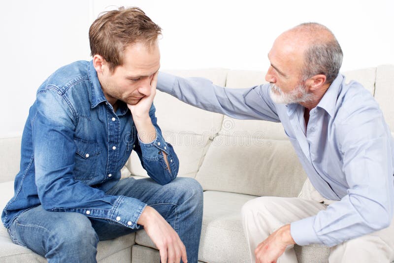 Younger Man Comforting Older Man Stock Image - Image of person, health ...