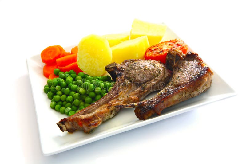 Comida Asada a La Parilla De Las Tajadas De Cordero Foto de archivo ...