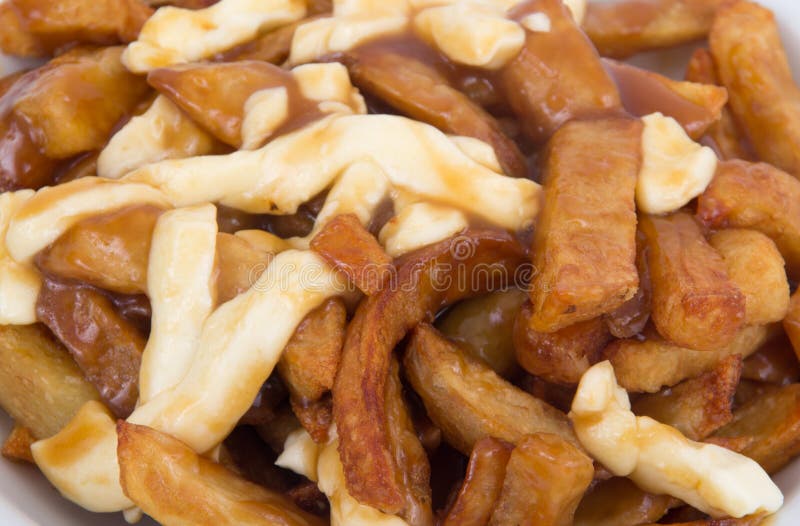 Comida De Poutine Quebec Con Las Patatas Fritas Foto de archivo ...