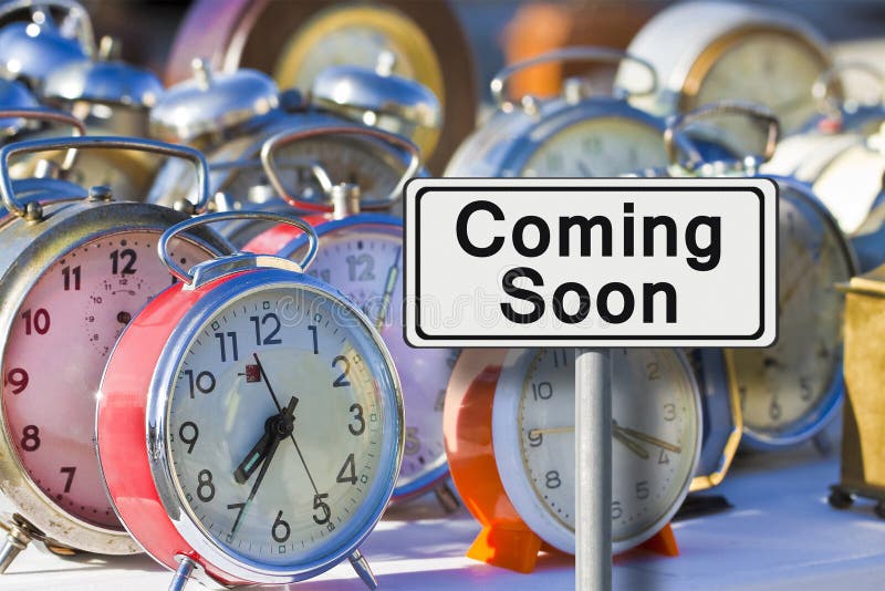 Coming Soon Sign - Concept Image with Old Colored Metal Table Clocks ...