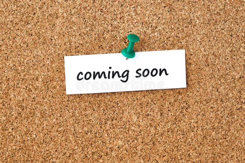 Coming Soon. Text Written on a Piece of Paper, Cork Board Background ...