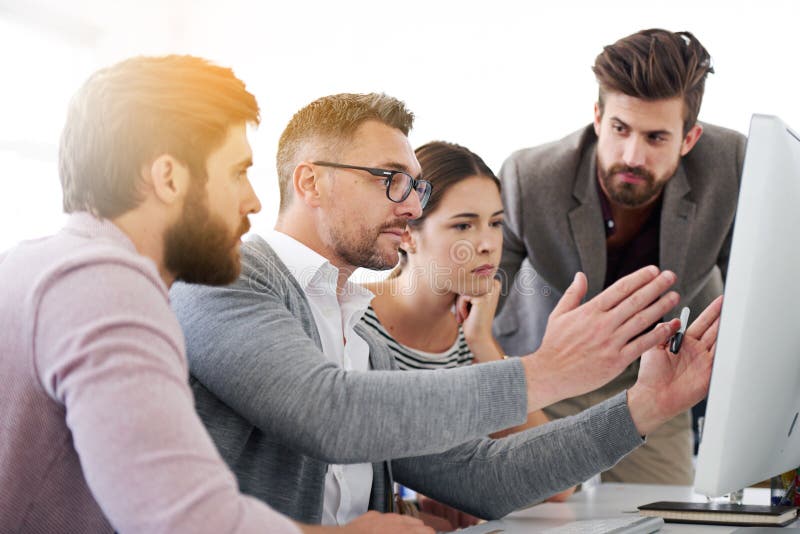 Coming Up with Loads of Innovative Ideas. a Group of Designers Working ...