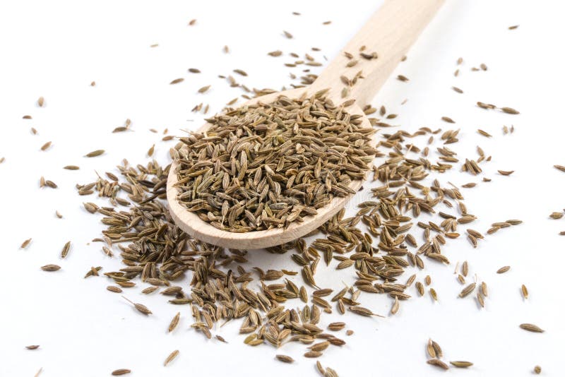 Comino En La Cuchara De Madera Aislada En El Fondo Blanco Primer Foto ...