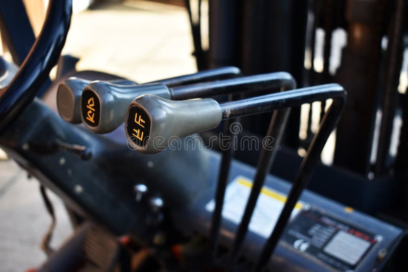 Command Sticks and Steering Wheel in Forklift Stock Photo - Image of ...