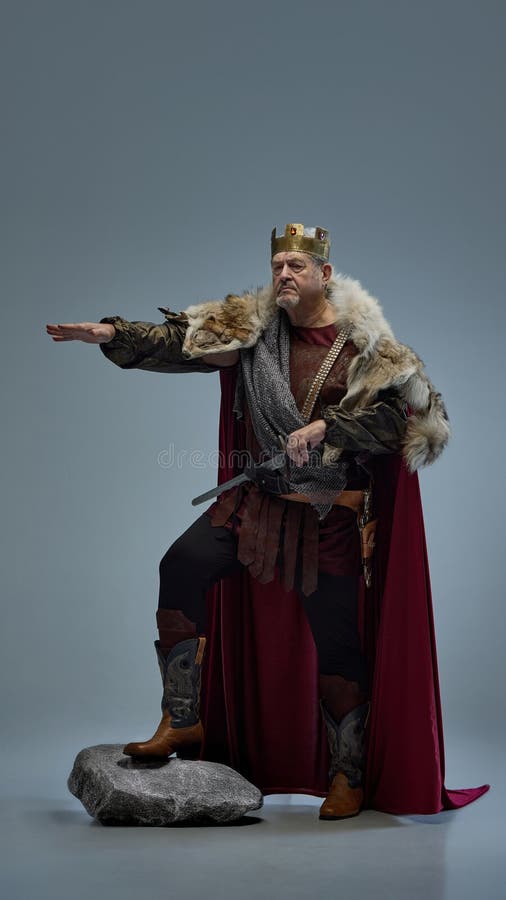 Commanding Medieval King on Rock, Pointing Forward with Authority ...