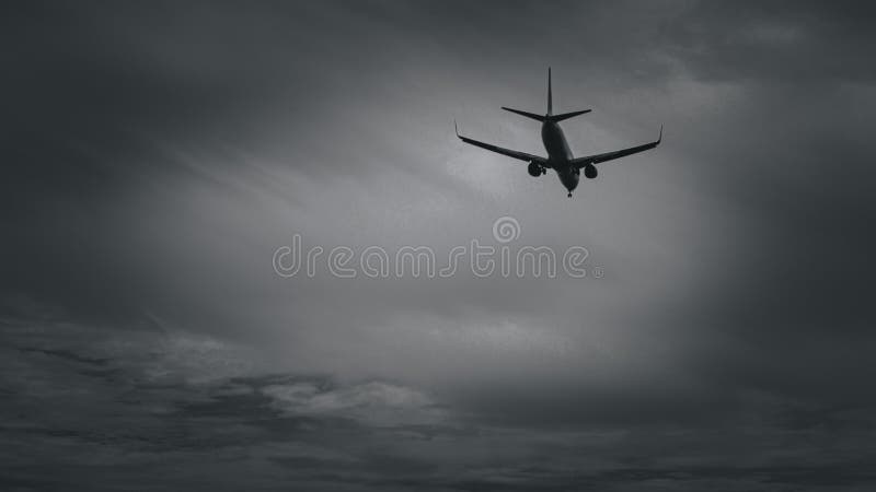 Commercial Aircraft in Bad Weather Stock Photo - Image of wind, black ...