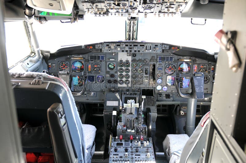 Inside jetliner cockpit stock photo. Image of airliner - 17917616